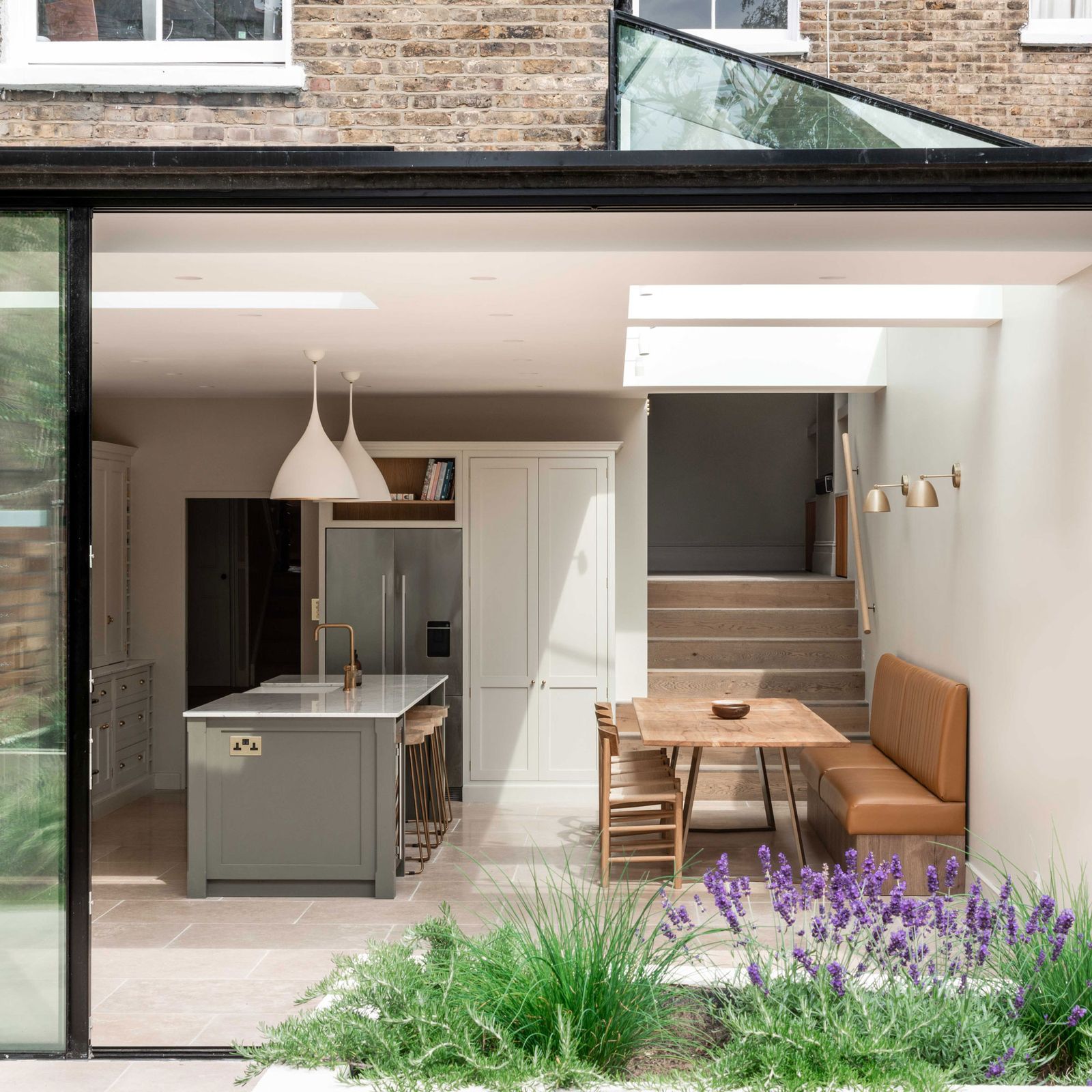 Dropping the floor level in this house has added both space and light ...