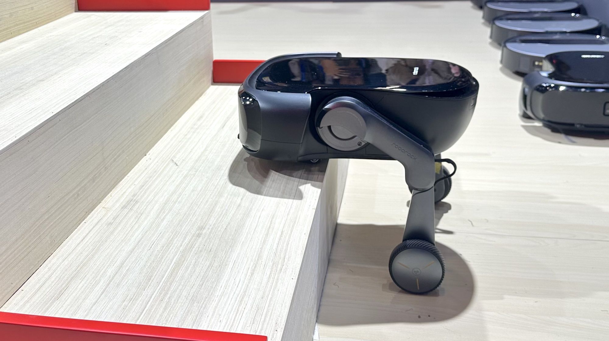 I just saw Roborock's new two-legged robot vacuum climb stairs — and ...