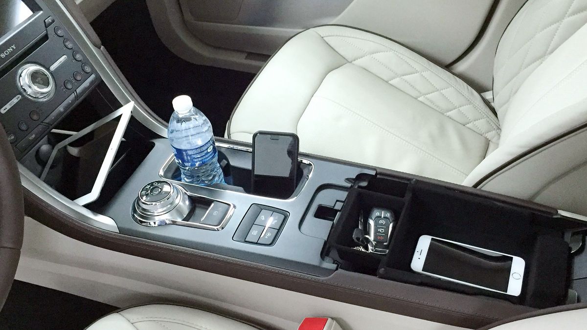 We have so many gadgets that we're forcing car interiors to change ...