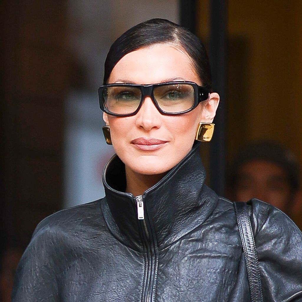 Gigi Hadid Wraps Herself in a DHL Tape Mini Dress for Vetements's Paris ...