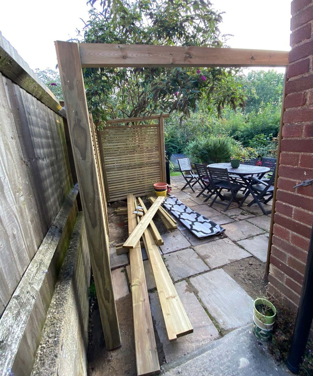 A couple made a cozy DIY garden shelter out of fence panels | Gardeningetc
