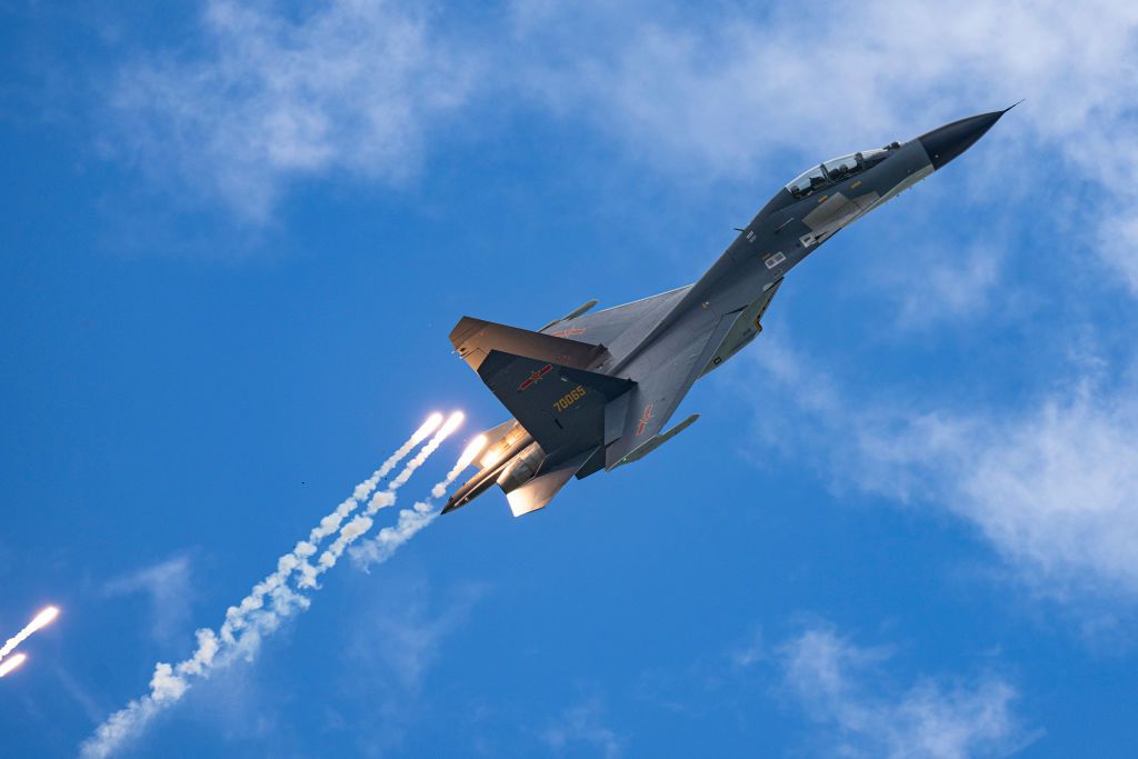 Chinese fighter jet nearly collides with Air Force plane in ...