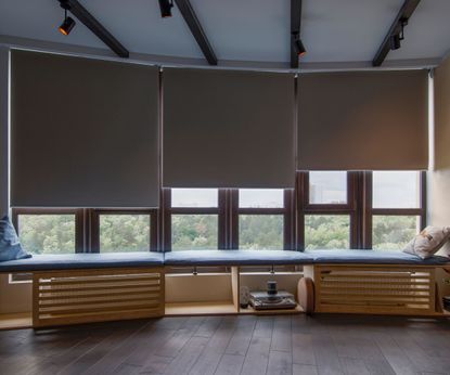 Does pointing a fan out of a window work to cool down a room? | Homes ...