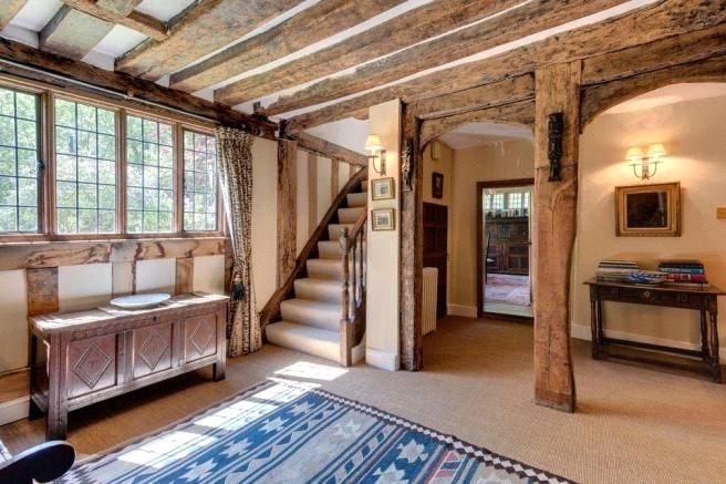 The late medieval farmhouse with part-moated gardens and grounds ...