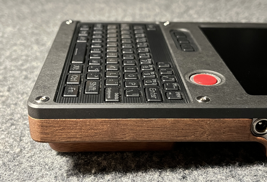 Raspberry Pi 5 powers retro-futurism 1980s cyberdeck with custom milled keypad and wood finish ...