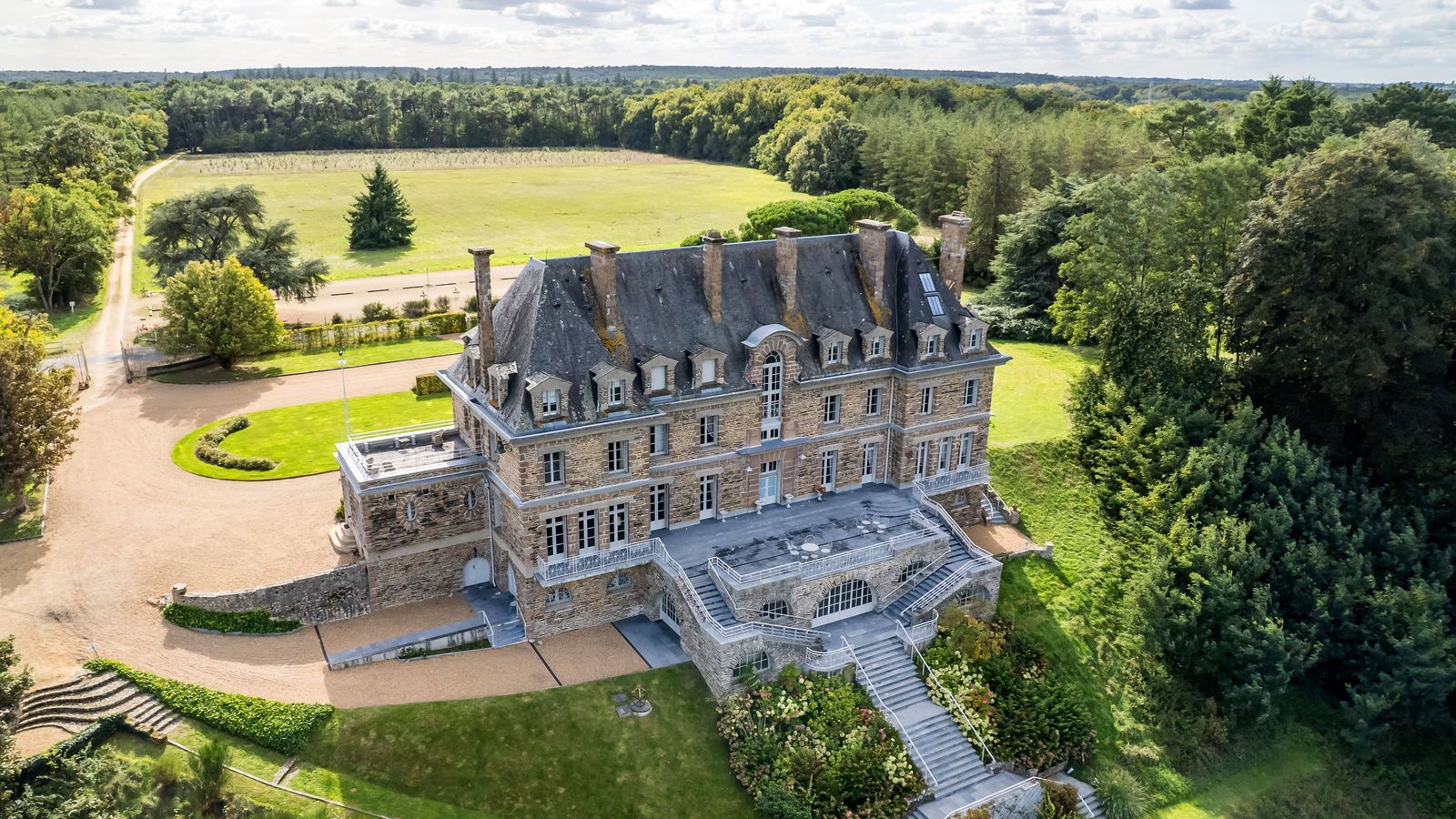 The pink granite chateau that the Cointreau family built in the Loire ...