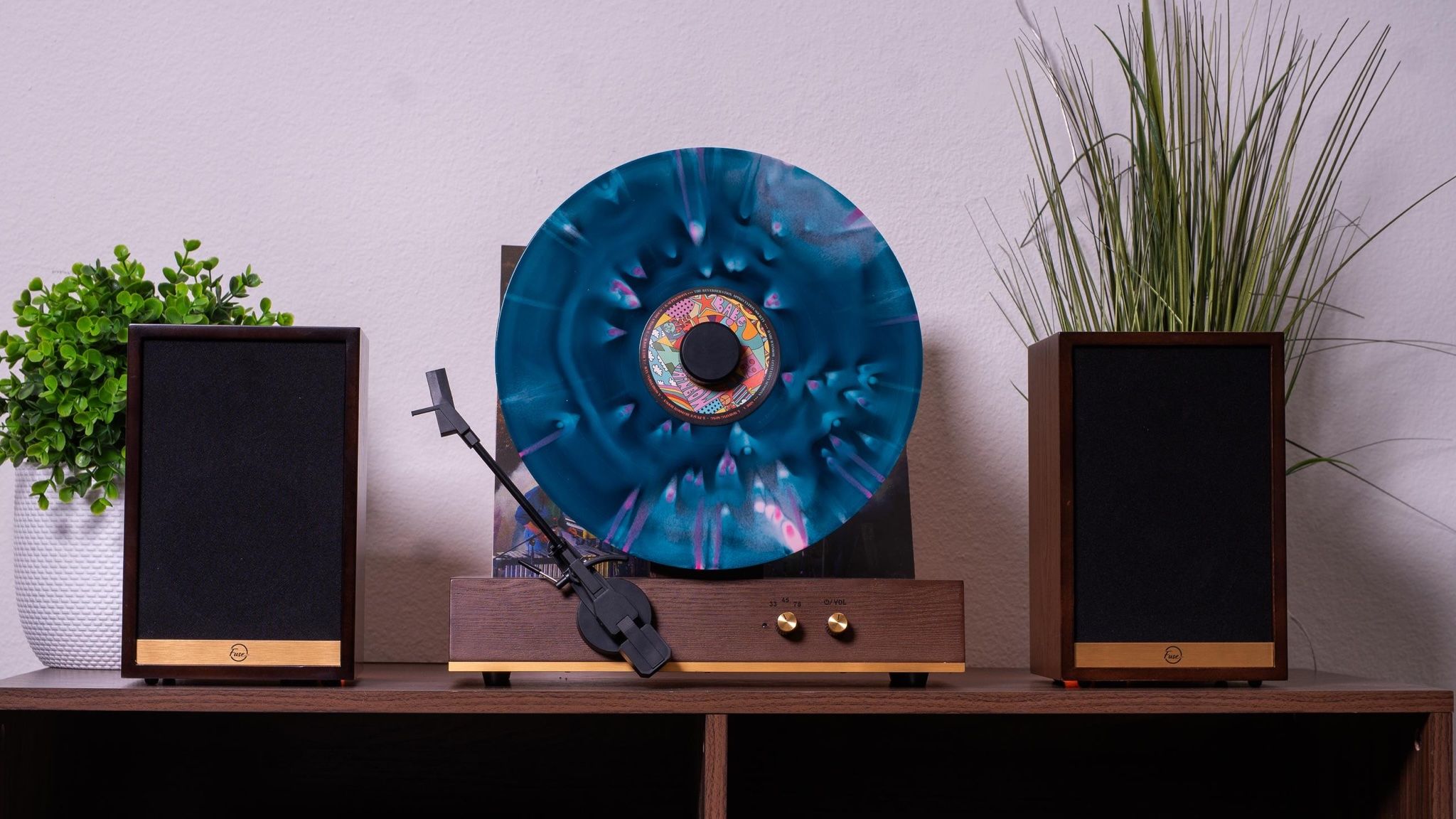 I doubt this retro-style vertical turntable and speakers combo is a ...