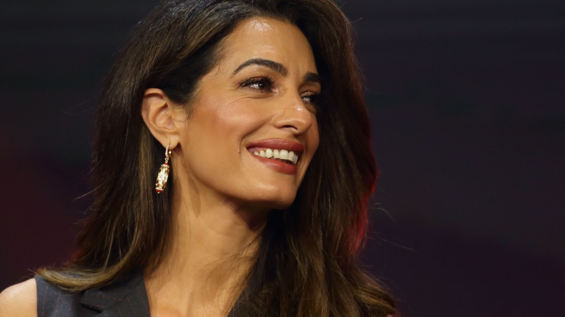 Amal Clooney's yellow jumpsuit had people turning heads in Madrid | Woman & Home