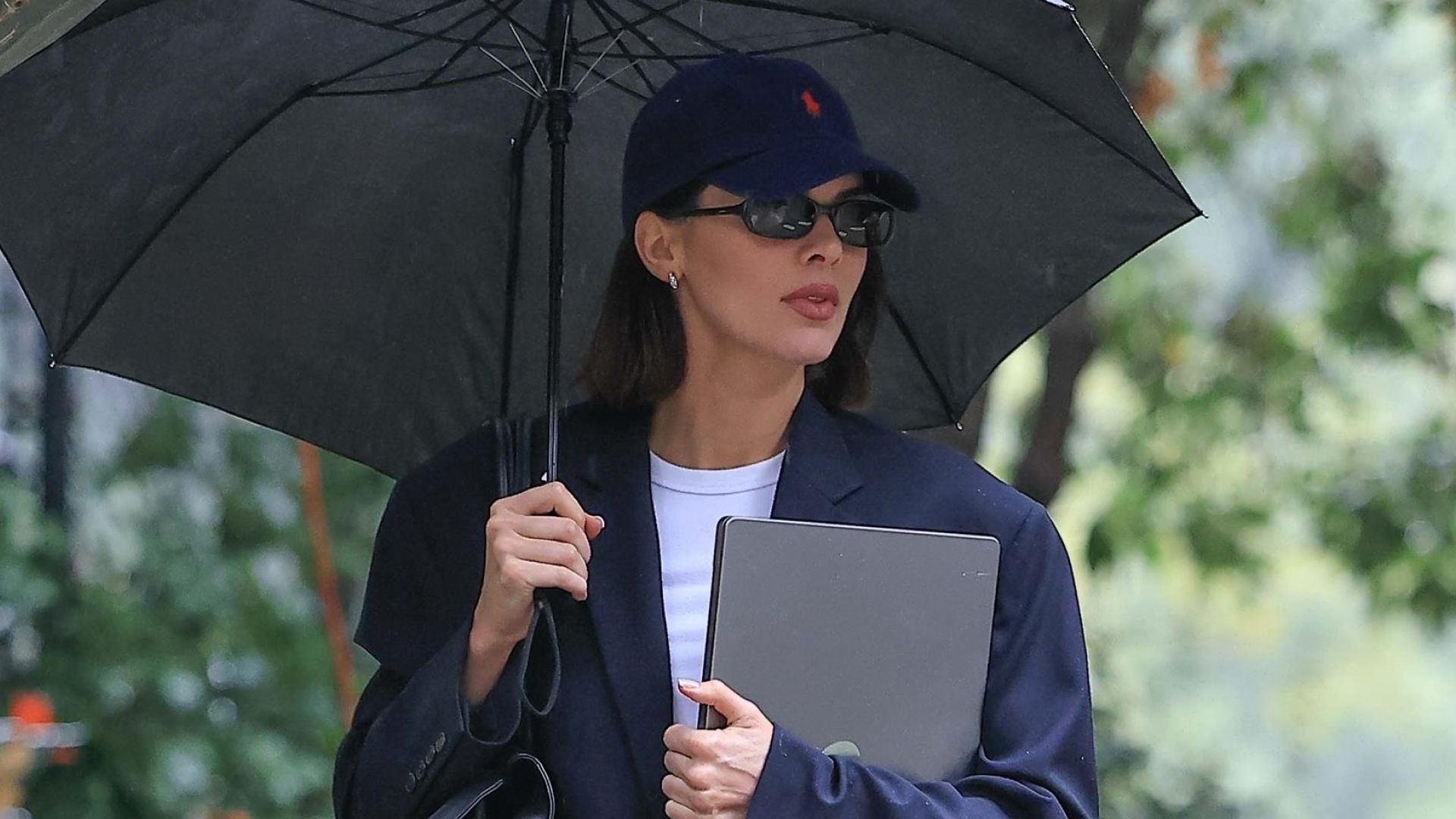 Kendall Jenner Wears Ugg Slides With White Socks for a Walk in the Rain ...