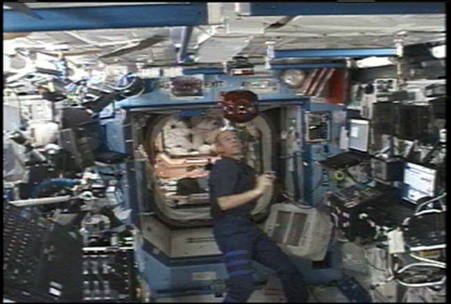 NASA Astronaut Tests Microsatellite Aboard Space Station | Space