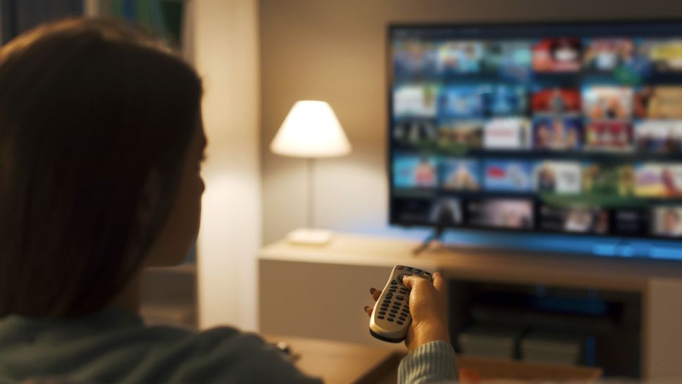 Is watching TV in bed that bad for your sleep? Here's what the experts ...