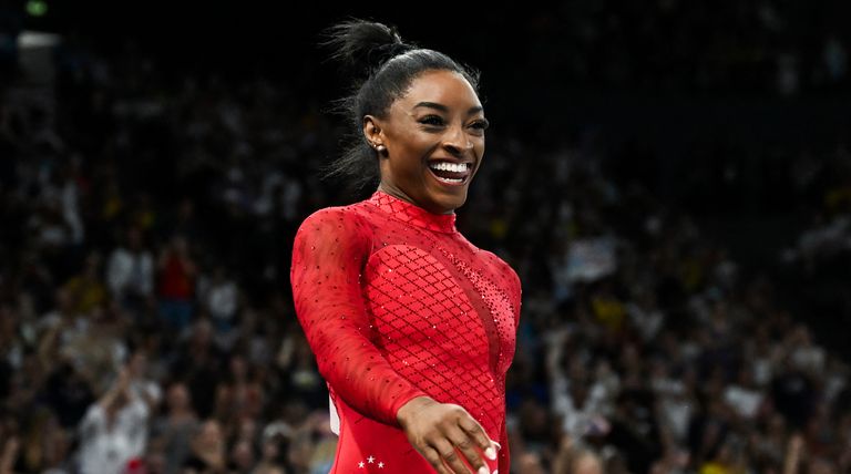 Simone Biles Wins Her 7th Olympic Gold Medal in "Power Color" Red ...