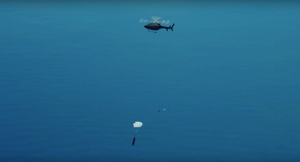 Rocket Lab aims to catch a falling Electron booster with a helicopter ...