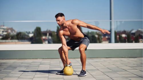 Bottoms-up kettlebell press exercise: How to do it and the benefits for ...