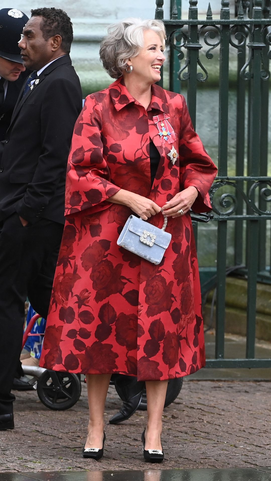 Emma Thompson's red coat and cheeky behavior at coronation | Woman & Home