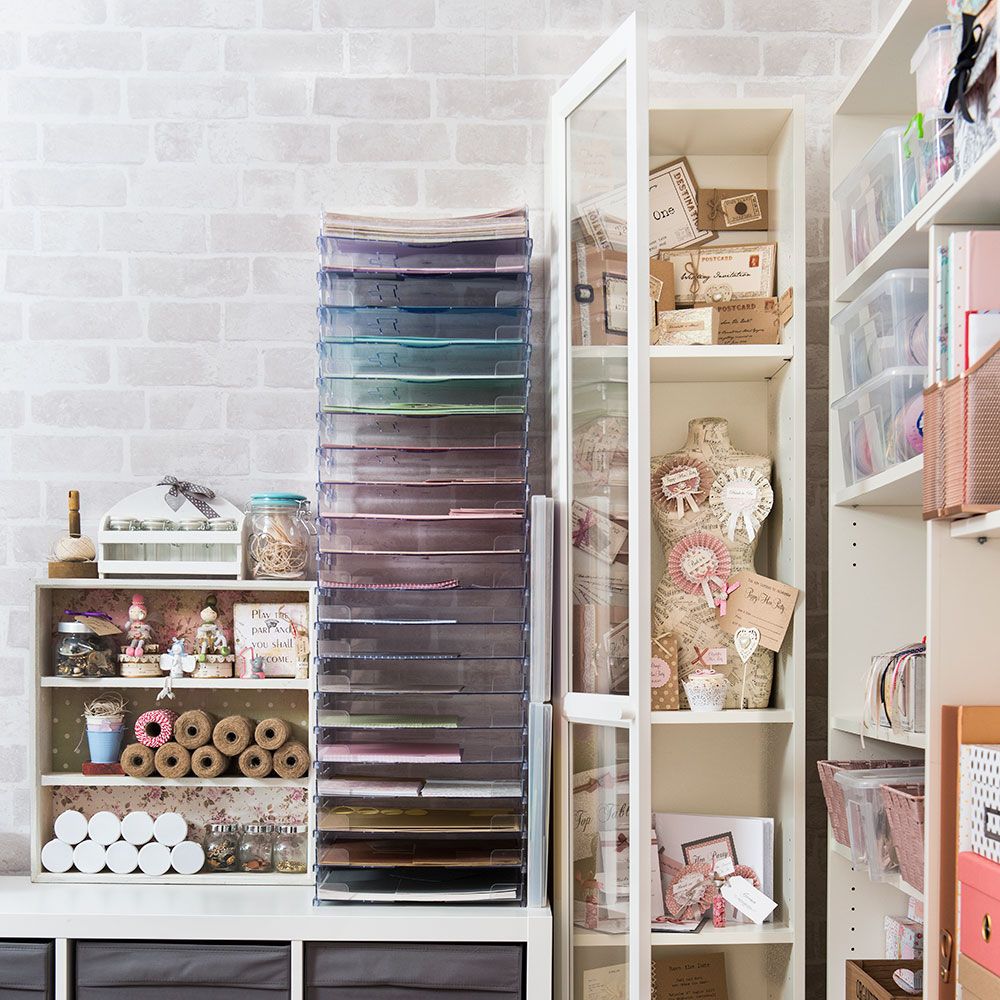 Craft room makeover with pink walls and brick wallpaper | Ideal Home