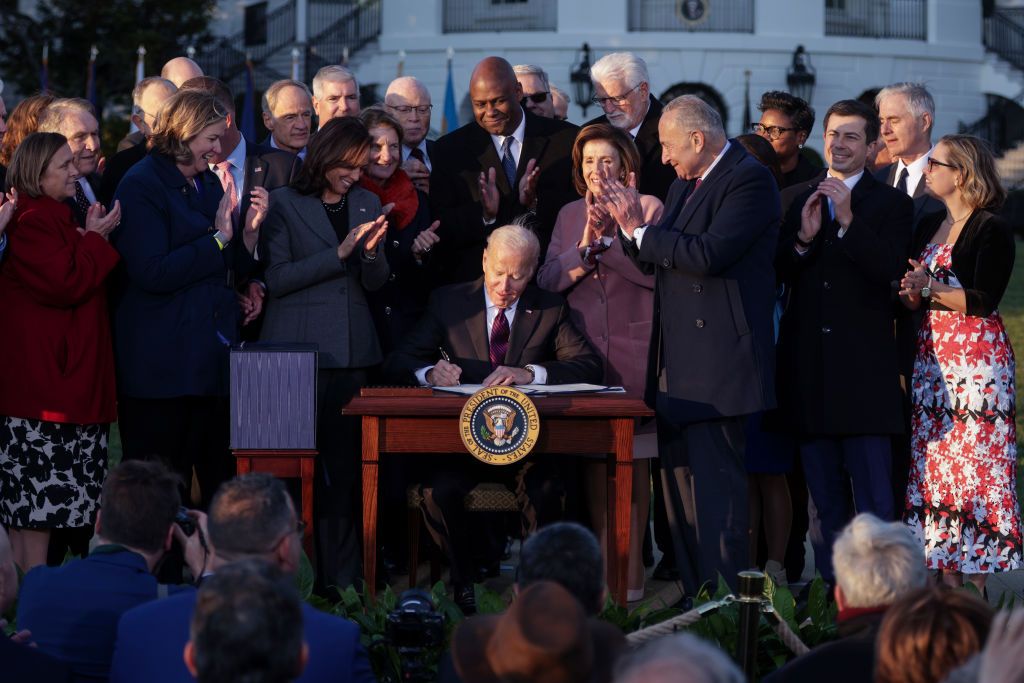 Biden signs bipartisan infrastructure bill into law: 'America is moving ...