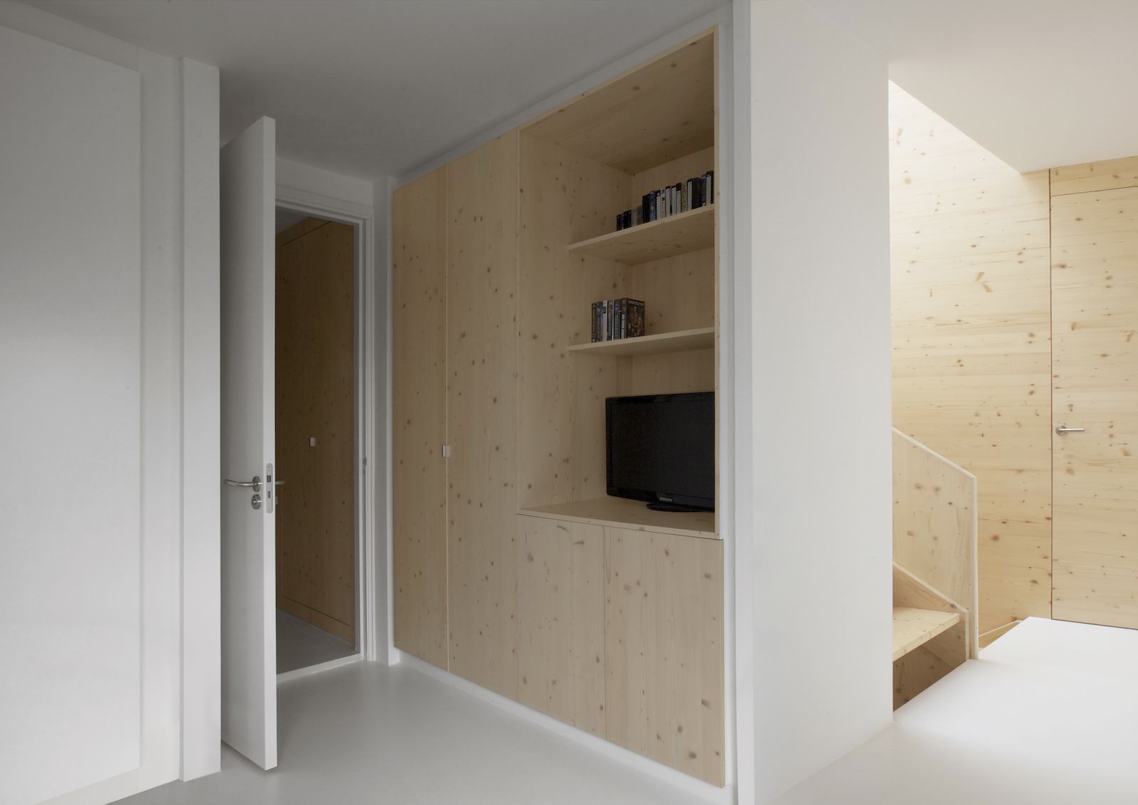Deliberate holes are the only decorative feature in this minimalist ...