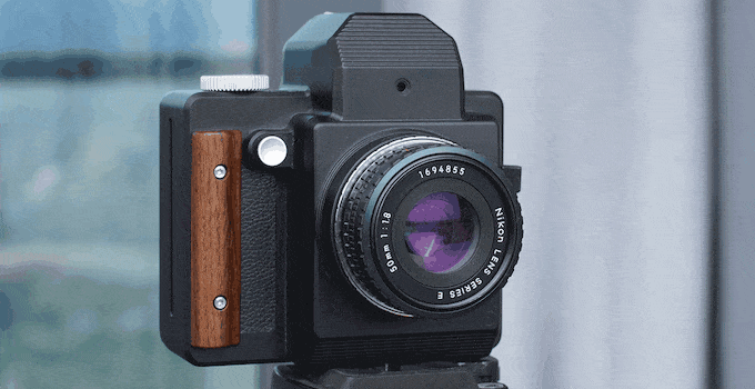 Franken-cam! This camera uses Instax film and takes Canon lenses ...