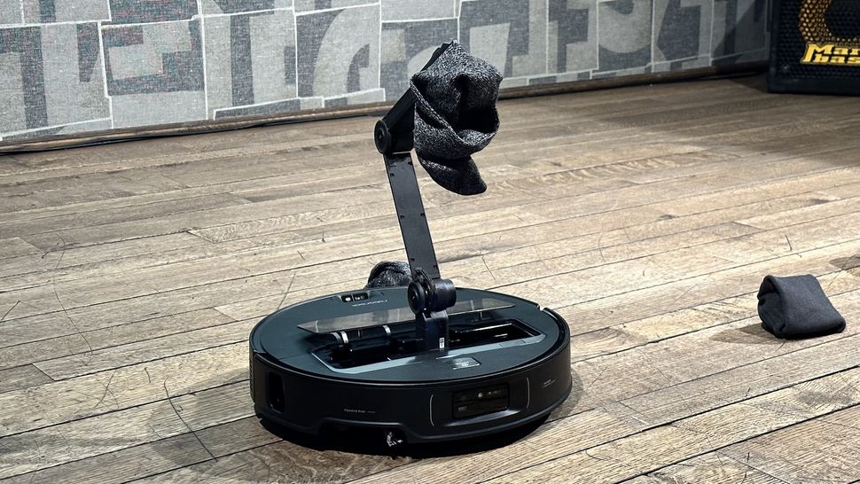 This new robot vacuum has a robotic arm that can pick up your socks ...