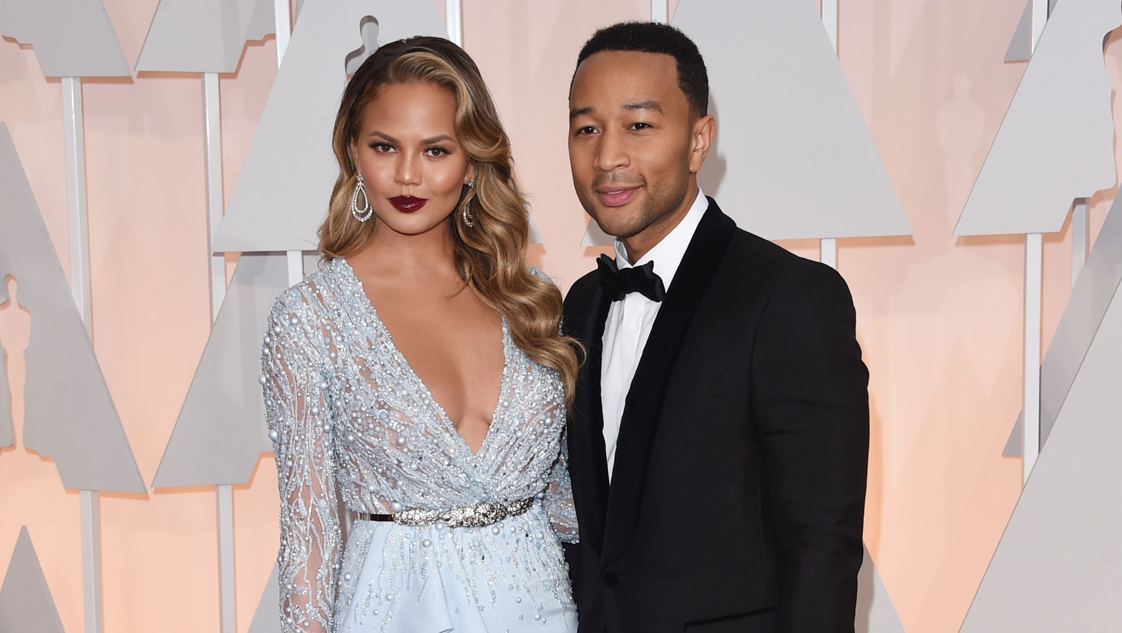 Chrissy Teigen and John Legend Got Matching Tattoos That Say Luna and ...