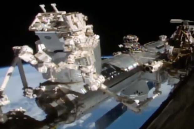 Space Station Robot Installs Neutron Star Explorer: Watch the Time ...