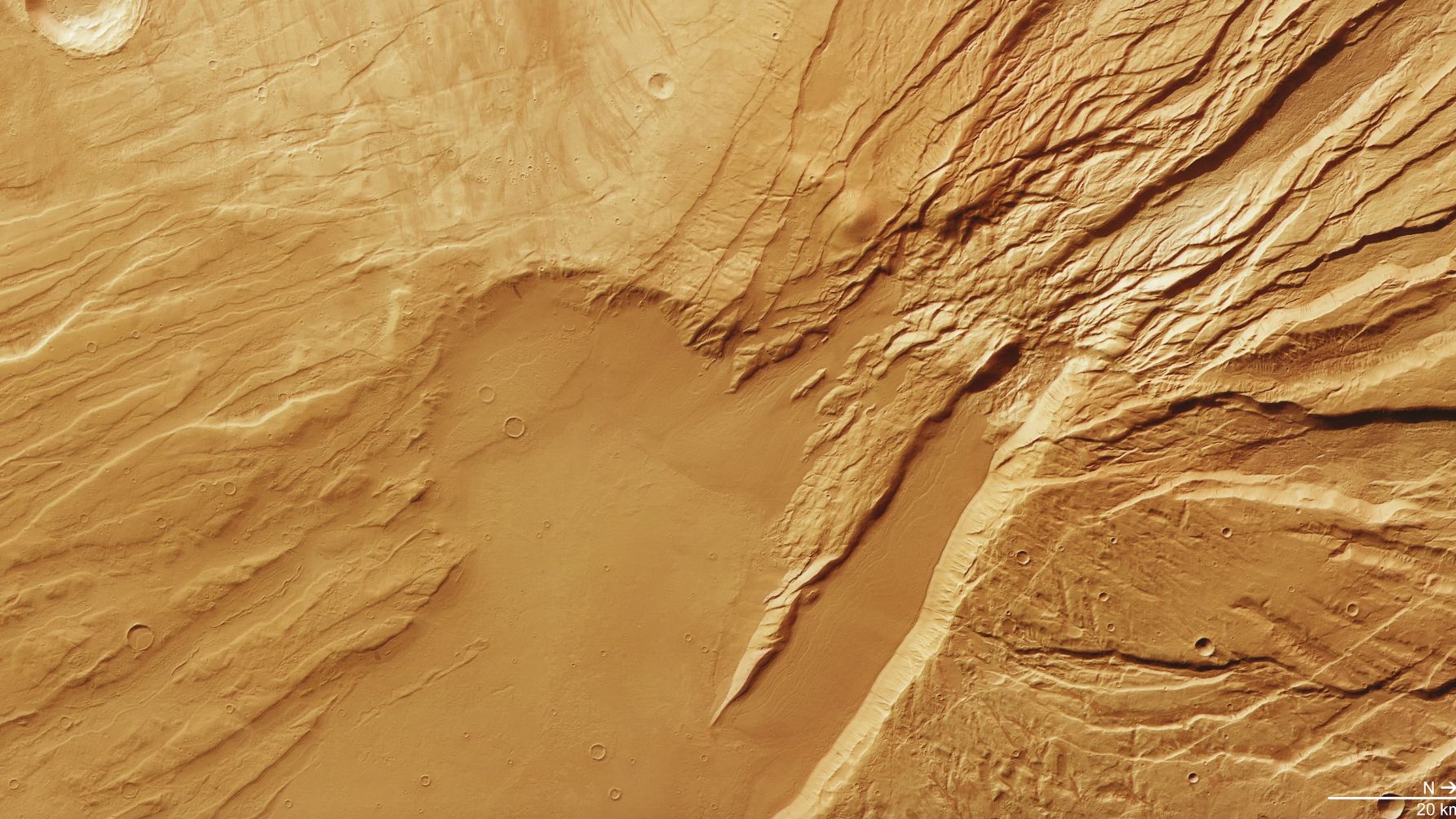 New photos from European Mars orbiter show dynamic, volcanic Red Planet ...