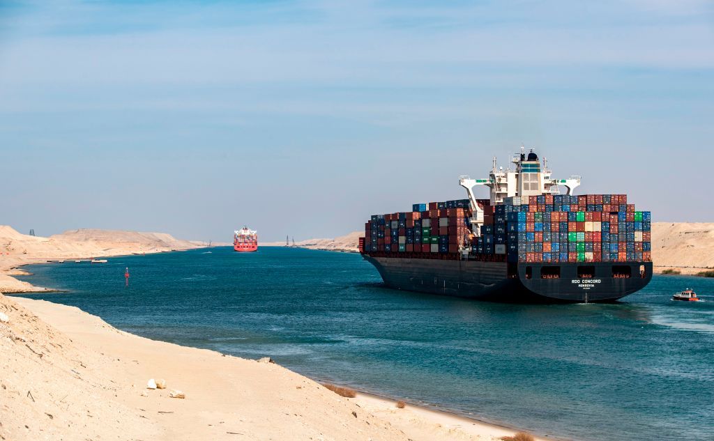 Massive container ship is wedged sideways in Egypt's Suez Canal ...