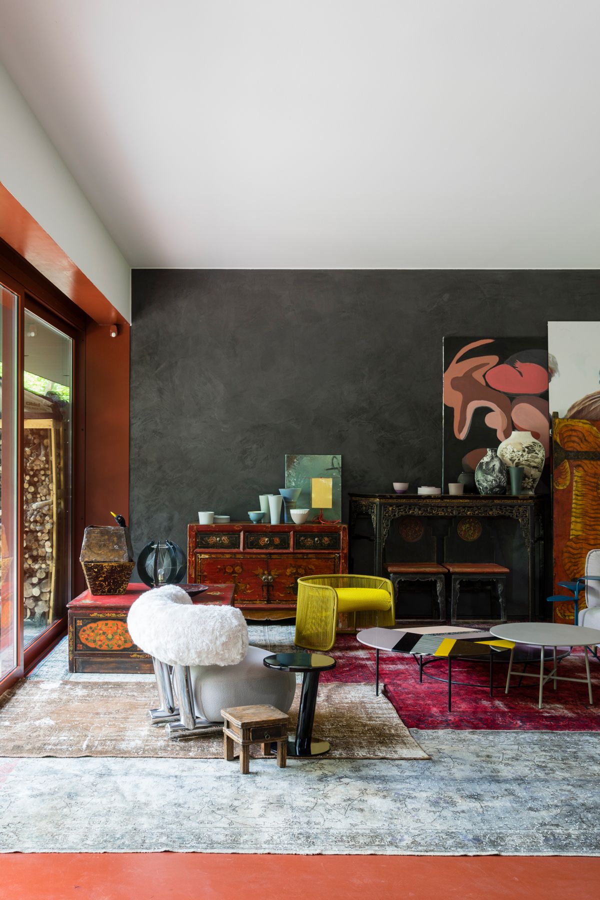 Explore this cabin-style house in Italy with colourful global ...