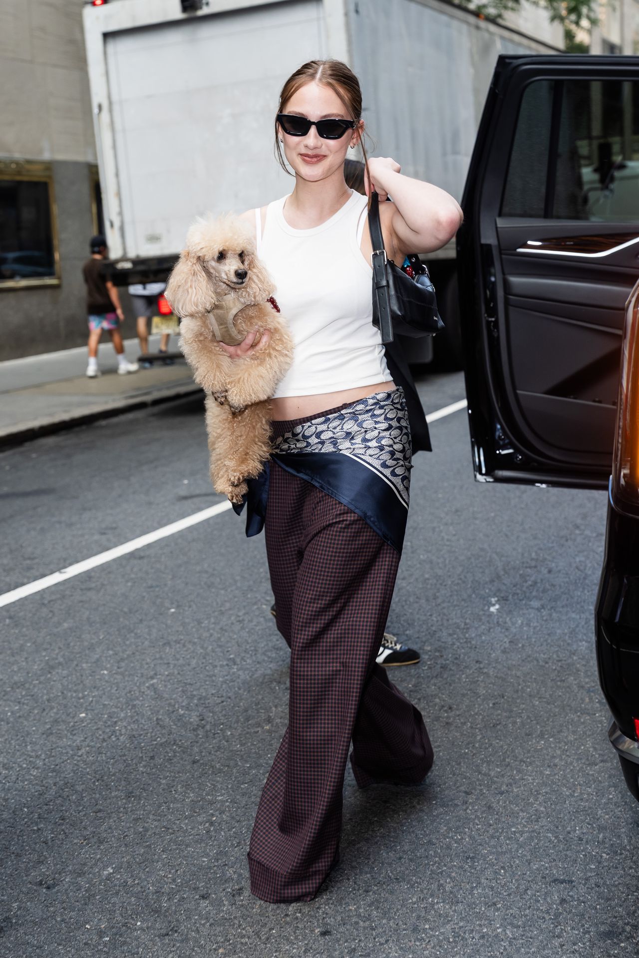 Lola Tung Carries Coach's Next It-Bag With an Even Buzzier Summer Scarf ...