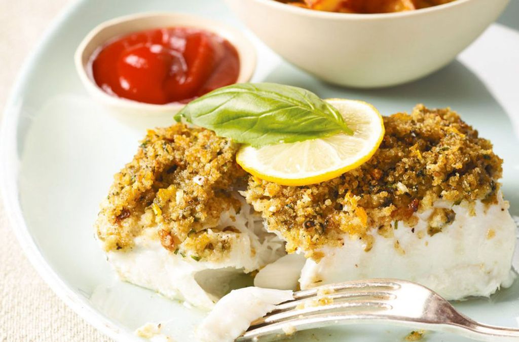Baked fish with pesto crust and chips | British Recipes | GoodtoKnow