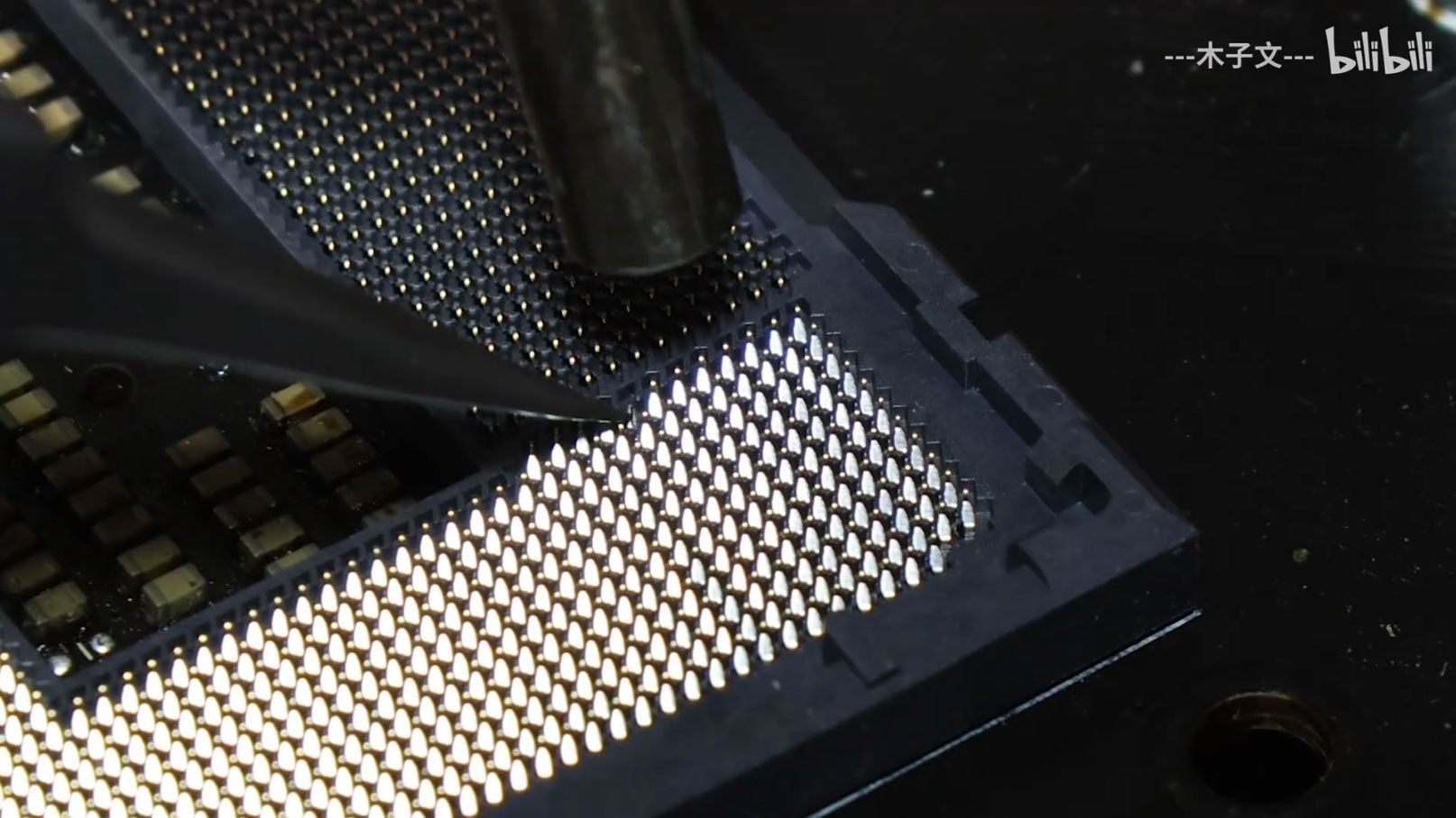 Enthusiast demos motherboard socket pin replacement — hot air, tweezers ...