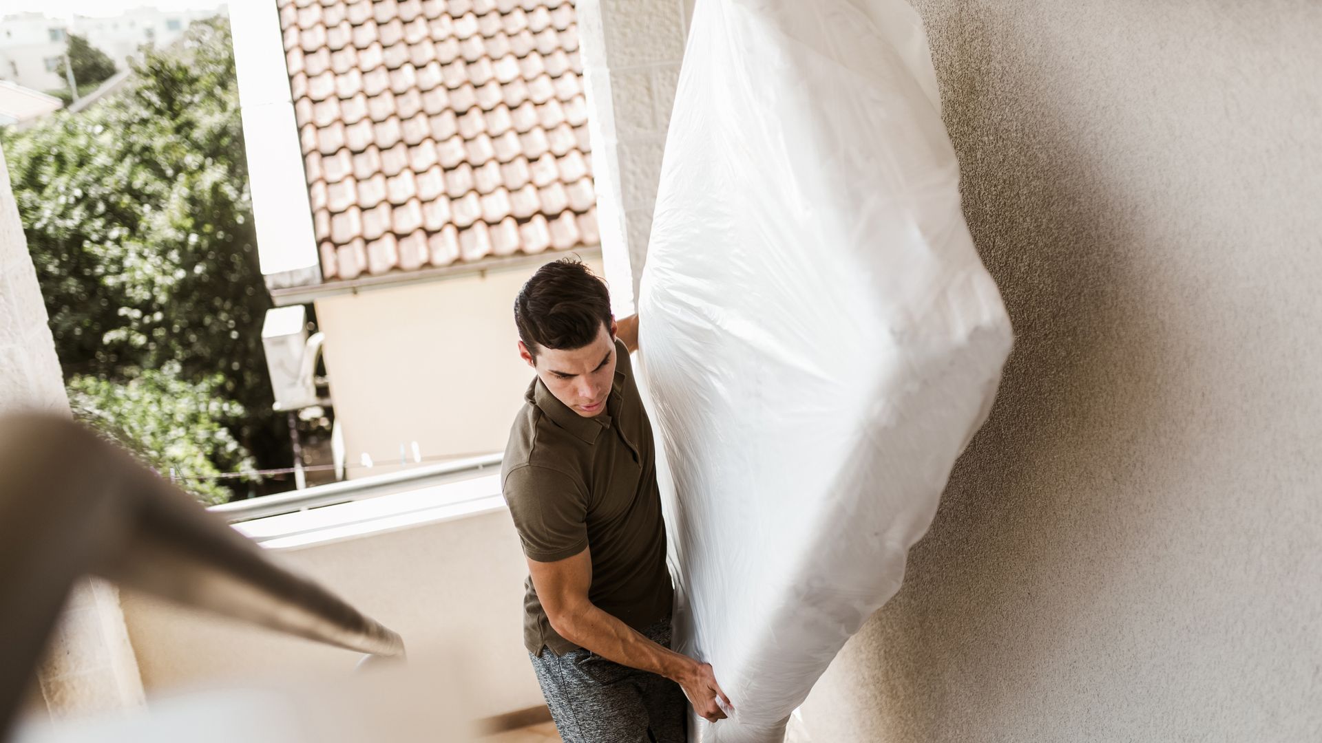 How to move a mattress by yourself without damaging it | Tom's Guide