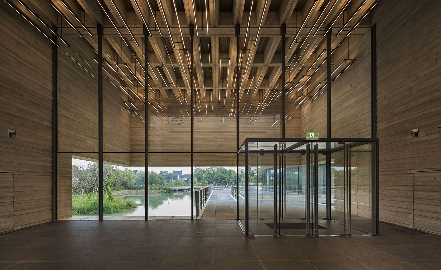 Low profile: the Muxin Art Museum is a delicate lakeside addition ...