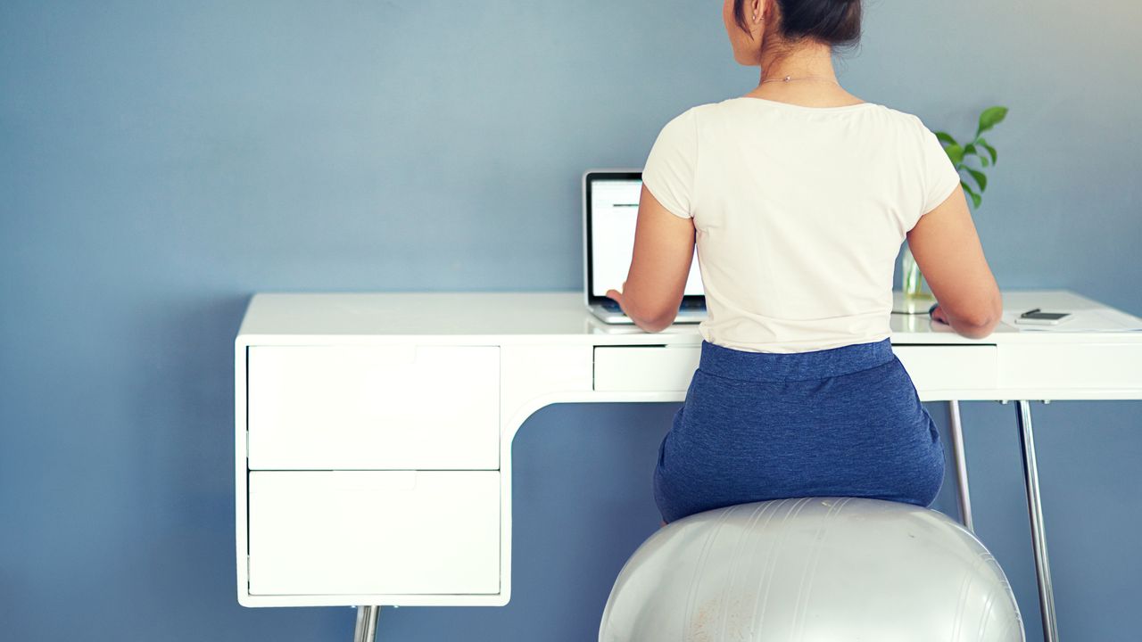 Swiss ball: Does sitting on a stability ball instead of an office chair ...