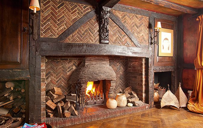 Six stunning properties with beautiful fireplaces | Country Life