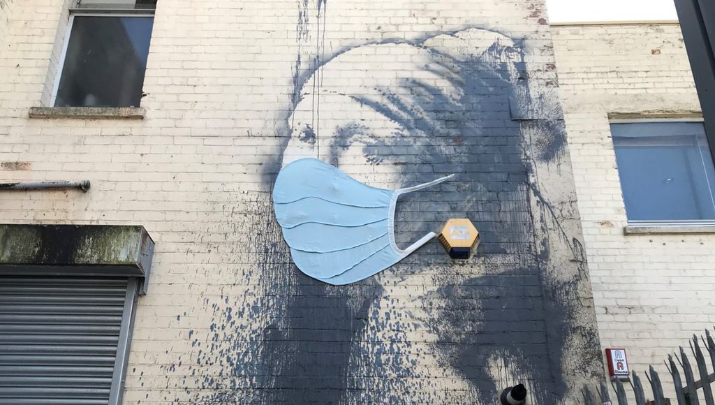 Did Banksy just add a face mask to one of his murals? | Creative Bloq