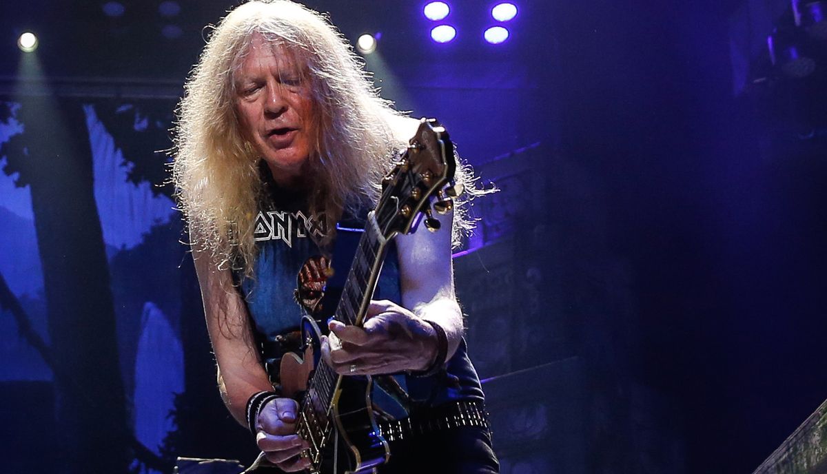 Watch Janick Gers accidentally toss his guitar into the crowd during an ...