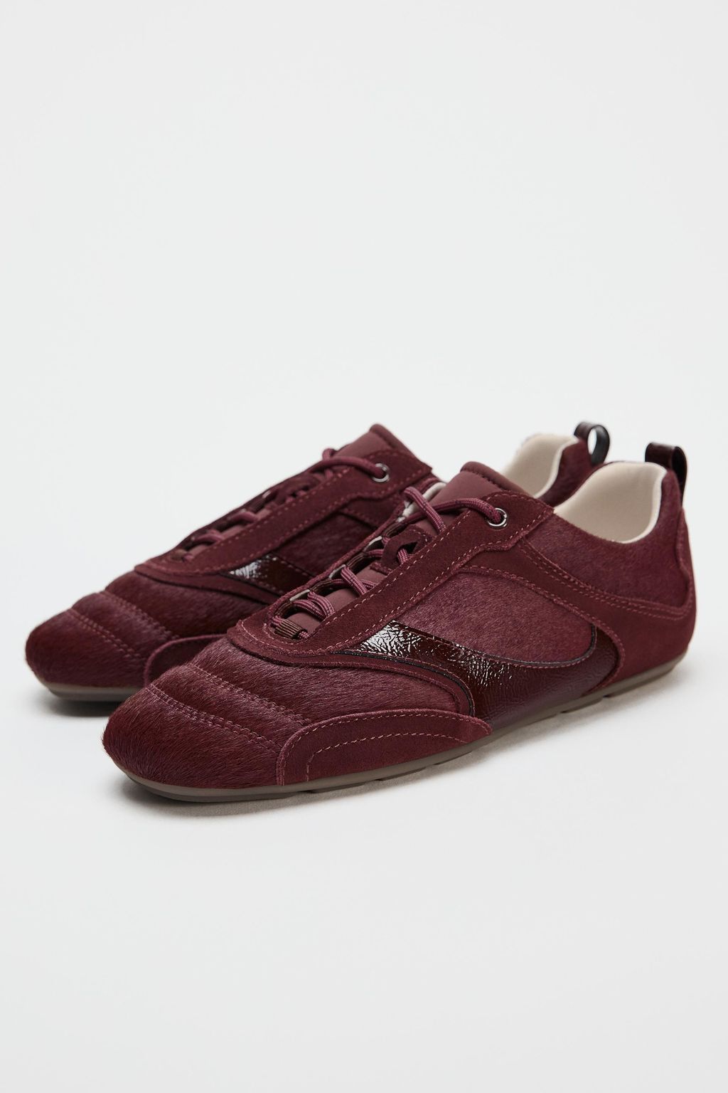 Chic and Rich-Looking, the Burgundy Trainer Trend Has Fashion People ...