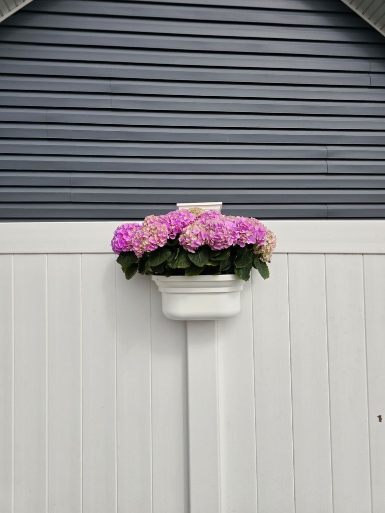 This "Fence Pot" Planter is Adds Pretty Blooms to PVC Fences | Livingetc