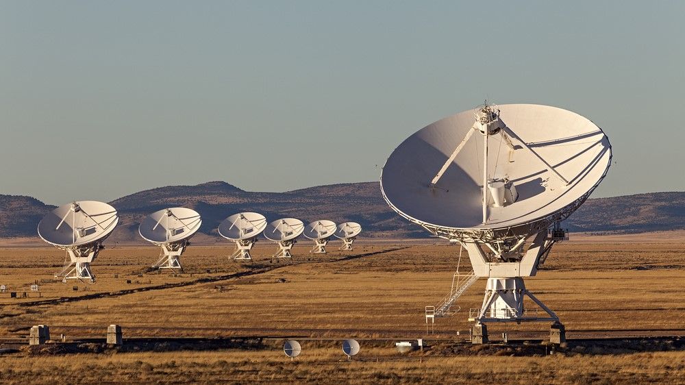 Elusive Planet Nine could be surrounded by hot moons, and that's how we ...