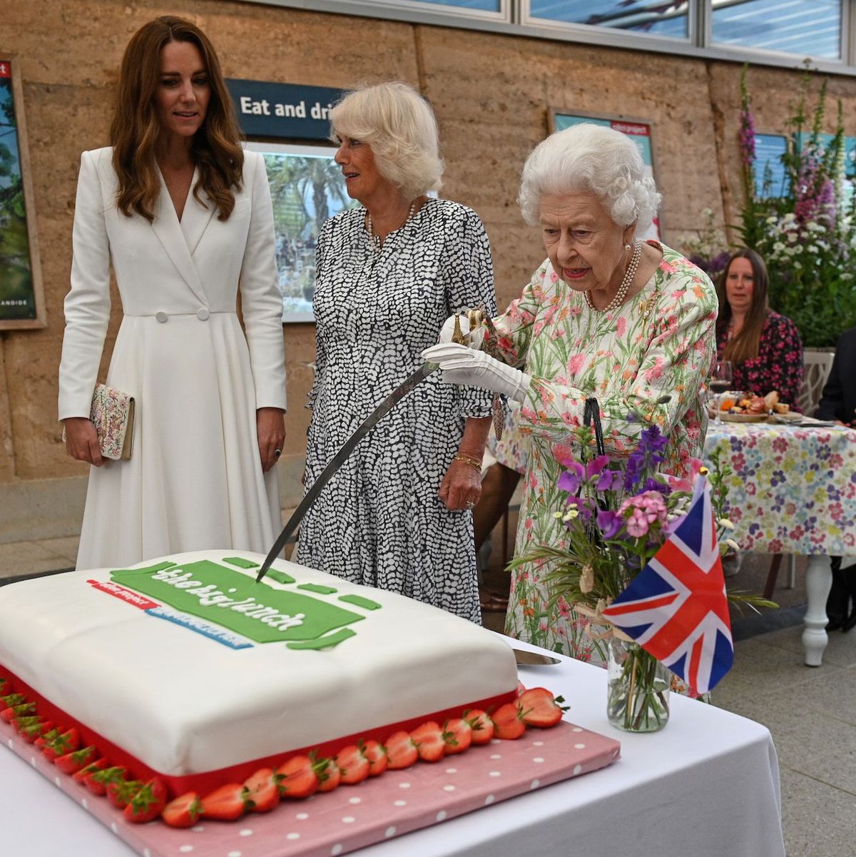 Queen Elizabeth Insisted on Cutting Her Cake with a Sword | Marie Claire