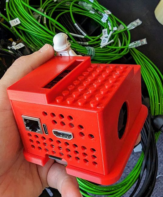 Raspberry Pi KVM Powers On 16 Mac Minis with 8 Servos | Tom's Hardware