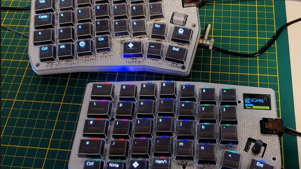 This modder is making the coolest keyboard ever by putting little OLED ...