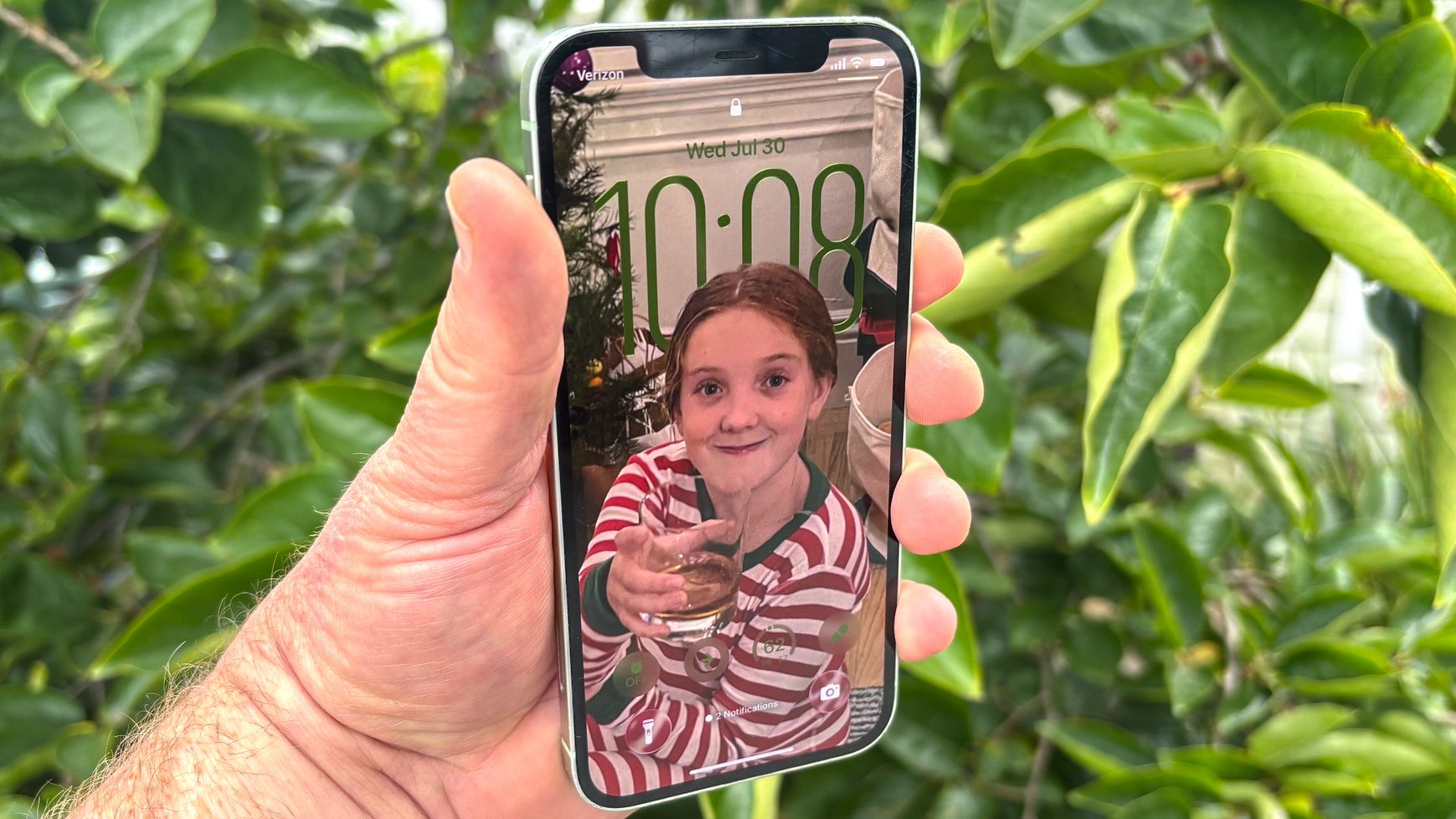 I customized my iPhone lock screen using iOS 26.2's new transparency slider and I'm happier with ...