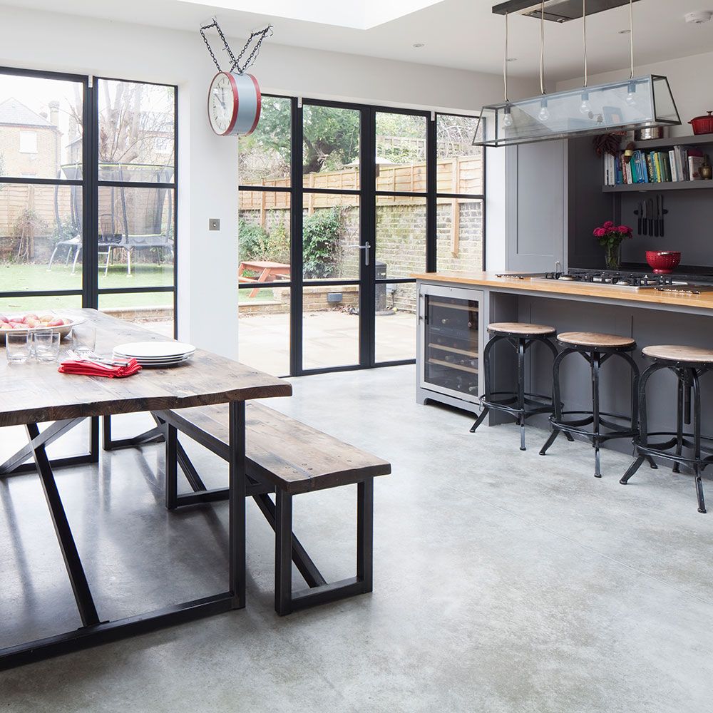 Kitchen makeover with grey Plain English units and concrete floors ...