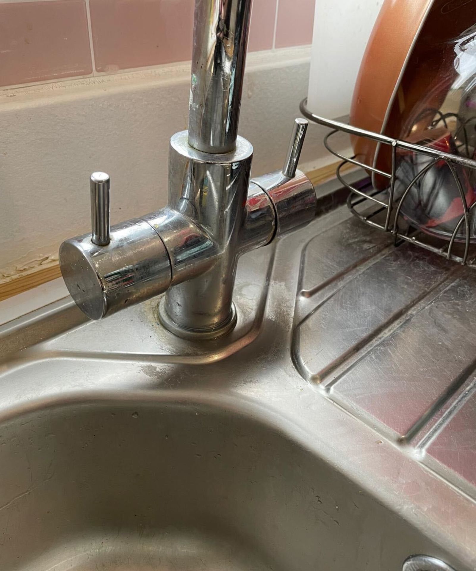 I cleaned stubborn faucet limescale with lemon juice | Homes and Gardens