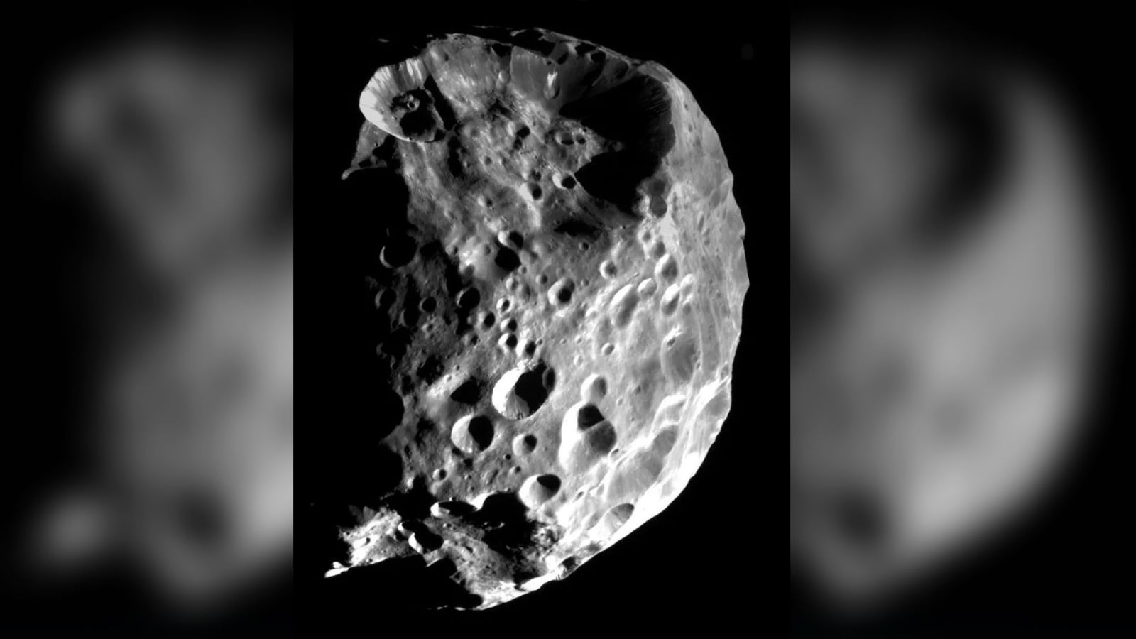 A passing star may have kicked the solar system's weirdest moons into ...