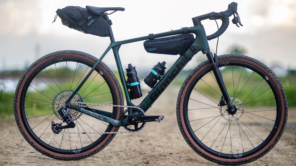 New Bianchi Arcadex adventure gravel bike adds internal frame storage and 50mm tyre clearance ...