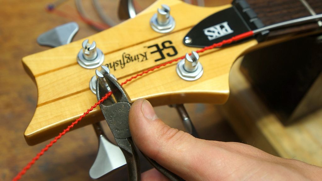 How to restring a bass guitar: guidance from a professional guitar ...